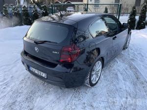 Black BMW 118 2010 in Riga, with an engine capacity of 2.00 L and mileage of 0 thousand km for 4250 €, photo 6 on AUTOMOTO.COM.LV