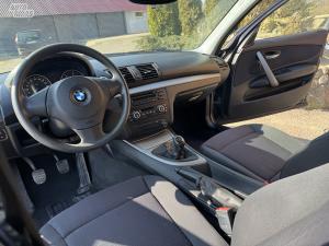 Black BMW 118 2010 in Alytus, with an engine capacity of 2.00 L and mileage of 301 thousand km for 3499 €, photo 12 on AUTOMOTO.COM.LV