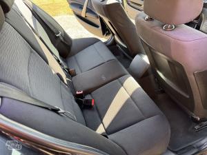 Black BMW 118 2010 in Vilnius, with an engine capacity of 2.00 L and mileage of 299 thousand km for 3499 €, photo 13 on AUTOMOTO.COM.LV