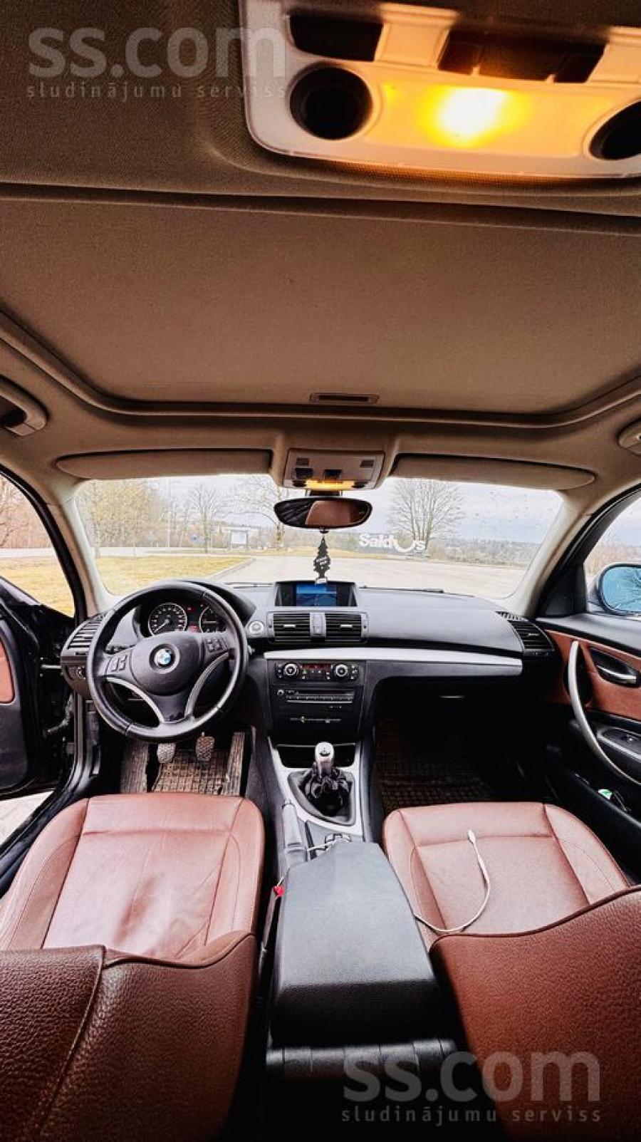 Black BMW 118 2010 in Saldus, with an engine capacity of 2.00 L and mileage of 310 thousand km for 4000 €, photo 6 on AUTOMOTO.COM.LV