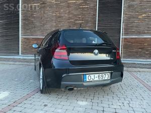 Black BMW 118 2010 in Riga, with an engine capacity of 2.00 L and mileage of 0 thousand km for 3700 €, photo 6 on AUTOMOTO.COM.LV