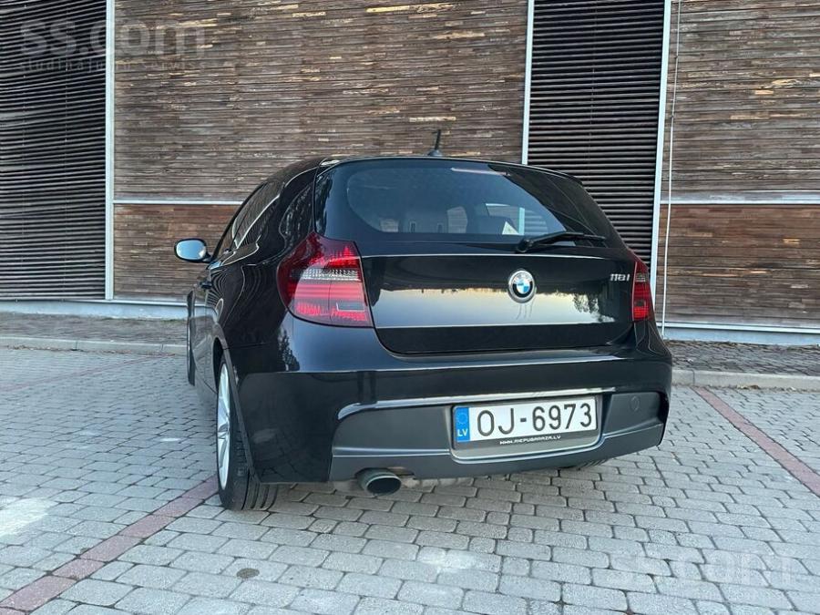 Black BMW 118 2010 in Riga, with an engine capacity of 2.00 L and mileage of 0 thousand km for 3700 €, photo 6 on AUTOMOTO.COM.LV