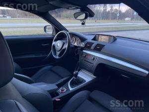 Black BMW 118 2010 in Riga, with an engine capacity of 2.00 L and mileage of 0 thousand km for 3700 €, photo 7 on AUTOMOTO.COM.LV