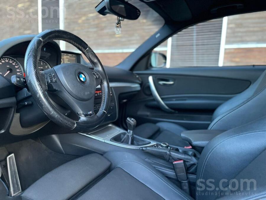 Black BMW 118 2010 in Riga, with an engine capacity of 2.00 L and mileage of 0 thousand km for 3700 €, photo 9 on AUTOMOTO.COM.LV