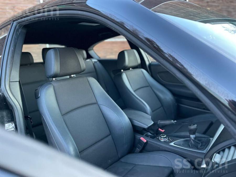 Black BMW 118 2010 in Riga, with an engine capacity of 2.00 L and mileage of 0 thousand km for 3700 €, photo 11 on AUTOMOTO.COM.LV