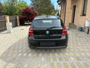 Black BMW 118 2010 in Riga, with an engine capacity of 2.00 L and mileage of 0 thousand km for 2800 €, photo 11 on AUTOMOTO.COM.LV