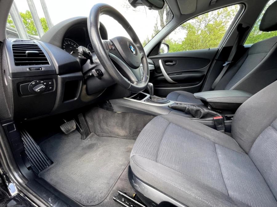 Black BMW 118 2010 in Riga, with an engine capacity of 2.00 L and mileage of 286 thousand km for 5650 €, photo 10 on AUTOMOTO.COM.LV