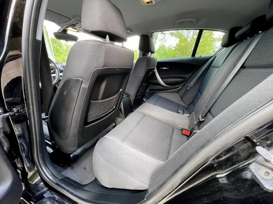 Black BMW 118 2010 in Riga, with an engine capacity of 2.00 L and mileage of 286 thousand km for 5650 €, photo 11 on AUTOMOTO.COM.LV