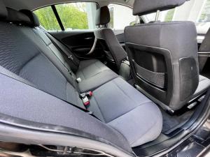 Black BMW 118 2010 in Riga, with an engine capacity of 2.00 L and mileage of 286 thousand km for 5650 €, photo 13 on AUTOMOTO.COM.LV