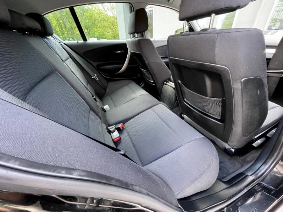 Black BMW 118 2010 in Riga, with an engine capacity of 2.00 L and mileage of 286 thousand km for 5650 €, photo 13 on AUTOMOTO.COM.LV