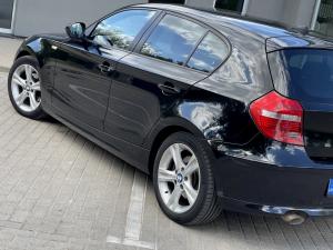 Black BMW 118 2010 in Riga, with an engine capacity of 2.00 L and mileage of 286 thousand km for 5650 €, photo 16 on AUTOMOTO.COM.LV