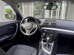 Black BMW 118 2010 in Riga, with an engine capacity of 2.00 L and mileage of 286 thousand km for 5650 €, photo 21 on AUTOMOTO.COM.LV