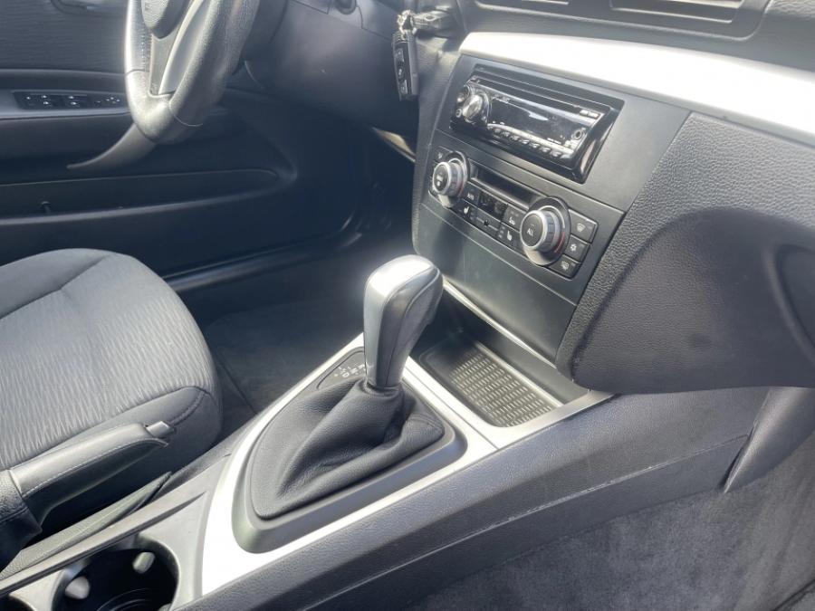 Black BMW 118 2010 in Riga, with an engine capacity of 2.00 L and mileage of 286 thousand km for 5650 €, photo 29 on AUTOMOTO.COM.LV