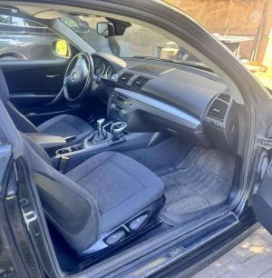 Black BMW 118 2010 in Kaunas, with an engine capacity of 2.00 L and mileage of 184 thousand km for 3400 €, photo 7 on AUTOMOTO.COM.LV