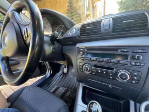 Black BMW 118 2010 in Kaunas, with an engine capacity of 2.00 L and mileage of 184 thousand km for 3400 €, photo 11 on AUTOMOTO.COM.LV