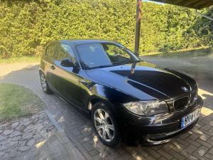 Black BMW 118 2010 in Kaunas, with an engine capacity of 2.00 L and mileage of 184 thousand km for 3400 €, photo 17 on AUTOMOTO.COM.LV