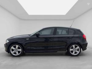 Black BMW 118 2010 in Kaunas, with an engine capacity of 2.00 L and mileage of 244 thousand km for 4490 €, photo 4 on AUTOMOTO.COM.LV