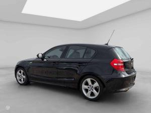 Black BMW 118 2010 in Kaunas, with an engine capacity of 2.00 L and mileage of 244 thousand km for 4490 €, photo 5 on AUTOMOTO.COM.LV