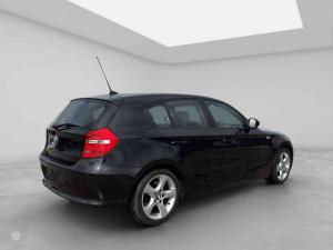 Black BMW 118 2010 in Kaunas, with an engine capacity of 2.00 L and mileage of 244 thousand km for 4490 €, photo 7 on AUTOMOTO.COM.LV