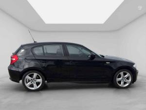 Black BMW 118 2010 in Kaunas, with an engine capacity of 2.00 L and mileage of 244 thousand km for 4490 €, photo 8 on AUTOMOTO.COM.LV