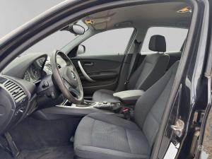Black BMW 118 2010 in Kaunas, with an engine capacity of 2.00 L and mileage of 244 thousand km for 4490 €, photo 10 on AUTOMOTO.COM.LV