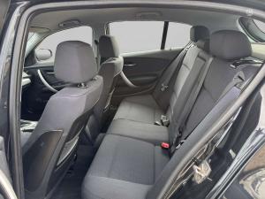 Black BMW 118 2010 in Kaunas, with an engine capacity of 2.00 L and mileage of 244 thousand km for 4490 €, photo 13 on AUTOMOTO.COM.LV