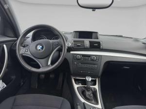 Black BMW 118 2010 in Kaunas, with an engine capacity of 2.00 L and mileage of 244 thousand km for 4490 €, photo 14 on AUTOMOTO.COM.LV
