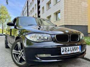 Black BMW 118 2010 in Vilnius, with an engine capacity of 2.00 L and mileage of 298 thousand km for 3850 €, photo  on AUTOMOTO.COM.LV