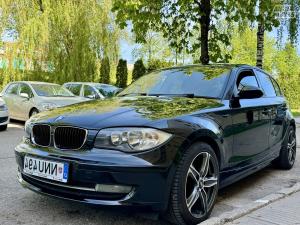Black BMW 118 2010 in Vilnius, with an engine capacity of 2.00 L and mileage of 298 thousand km for 3850 €, photo 32 on AUTOMOTO.COM.LV