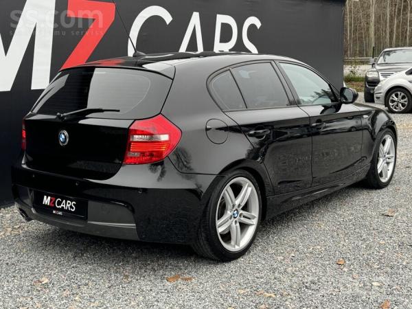Black BMW 118 2011 in Riga, with an engine capacity of 2.00 L and mileage of 264 thousand km for 5990 €, photo 3 on AUTOMOTO.COM.LV