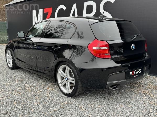 Black BMW 118 2011 in Riga, with an engine capacity of 2.00 L and mileage of 264 thousand km for 5990 €, photo 4 on AUTOMOTO.COM.LV