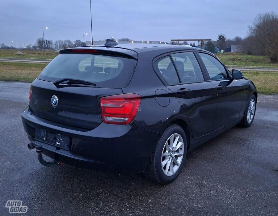 Black BMW 118 2011 in Kaunas, with an engine capacity of 2.00 L and mileage of 200 thousand km for 5100 €, photo 6 on AUTOMOTO.COM.LV