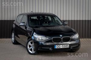 Black BMW 118 2011 in Tukums, with an engine capacity of 2.00 L and mileage of 203 thousand km for 6990 €, photo  on AUTOMOTO.COM.LV