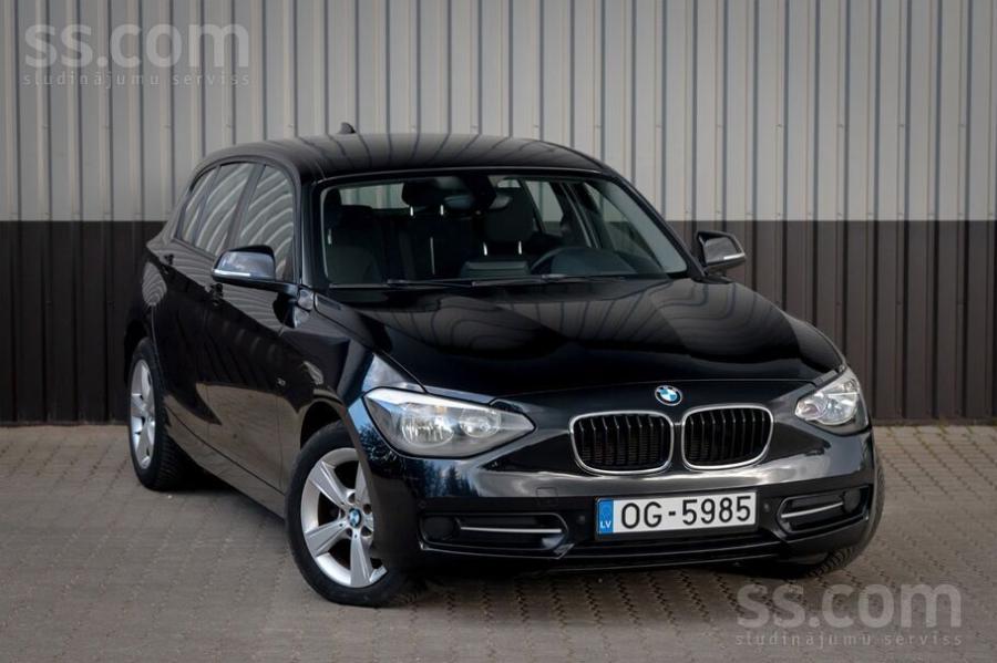 Black BMW 118 2011 in Tukums, with an engine capacity of 2.00 L and mileage of 203 thousand km for 6990 €, photo 1 on AUTOMOTO.COM.LV