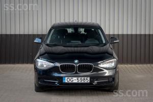 Black BMW 118 2011 in Tukums, with an engine capacity of 2.00 L and mileage of 203 thousand km for 6990 €, photo 2 on AUTOMOTO.COM.LV