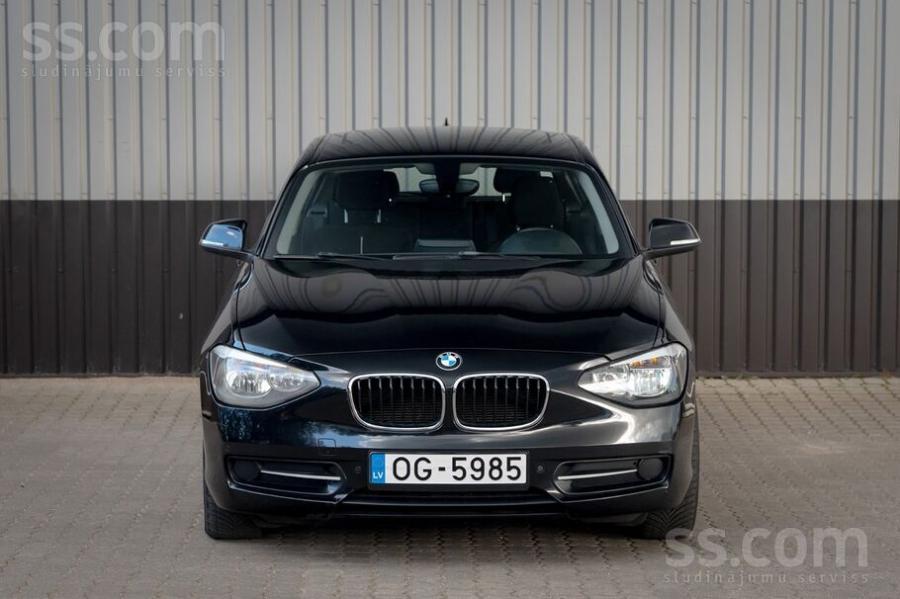 Black BMW 118 2011 in Tukums, with an engine capacity of 2.00 L and mileage of 203 thousand km for 6990 €, photo 2 on AUTOMOTO.COM.LV