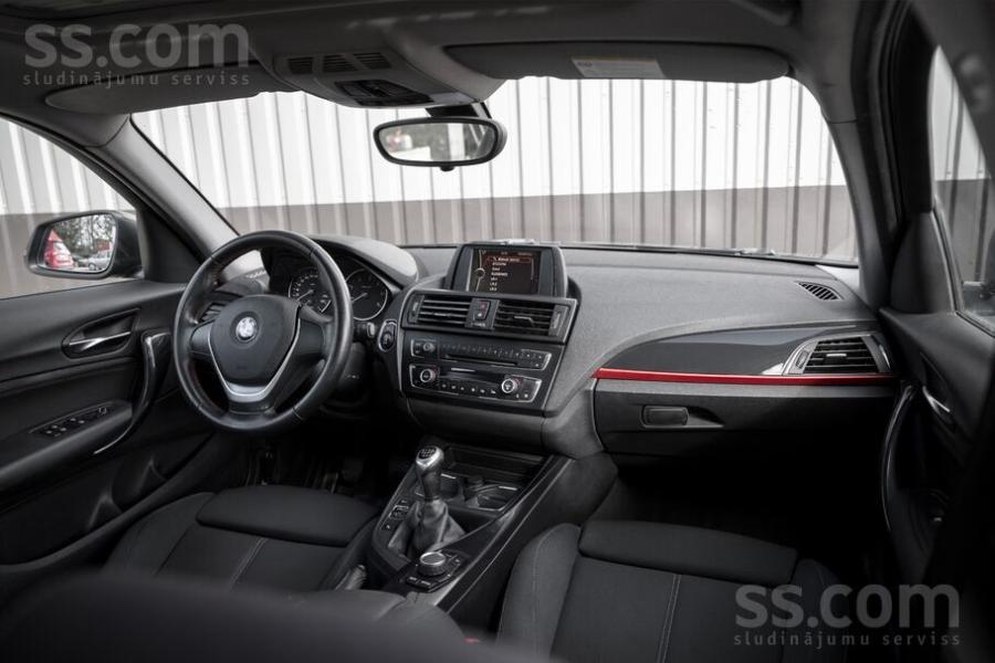 Black BMW 118 2011 in Tukums, with an engine capacity of 2.00 L and mileage of 203 thousand km for 6990 €, photo 8 on AUTOMOTO.COM.LV