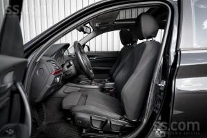 Black BMW 118 2011 in Tukums, with an engine capacity of 2.00 L and mileage of 203 thousand km for 6990 €, photo 9 on AUTOMOTO.COM.LV