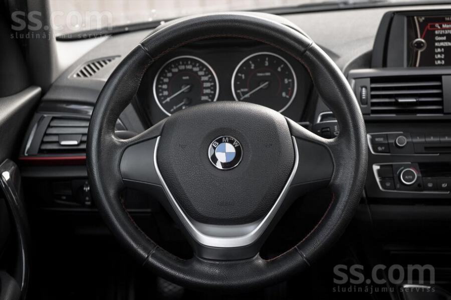 Black BMW 118 2011 in Tukums, with an engine capacity of 2.00 L and mileage of 203 thousand km for 6990 €, photo 16 on AUTOMOTO.COM.LV