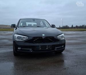 Black BMW 118 2011 in Kaunas, with an engine capacity of 2.00 L and mileage of 200 thousand km for 5100 €, photo  on AUTOMOTO.COM.LV