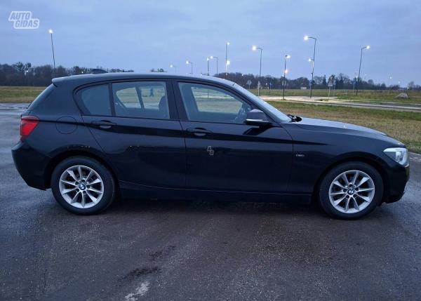 Black BMW 118 2011 in Kaunas, with an engine capacity of 2.00 L and mileage of 200 thousand km for 5100 €, photo 4 on AUTOMOTO.COM.LV
