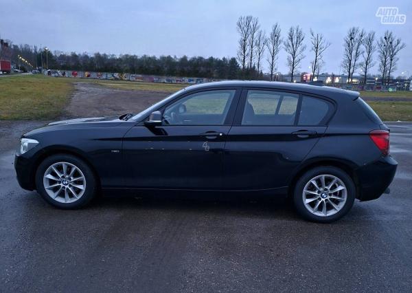 Black BMW 118 2011 in Kaunas, with an engine capacity of 2.00 L and mileage of 200 thousand km for 5100 €, photo 5 on AUTOMOTO.COM.LV