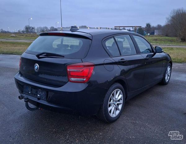 Black BMW 118 2011 in Kaunas, with an engine capacity of 2.00 L and mileage of 200 thousand km for 5100 €, photo 6 on AUTOMOTO.COM.LV
