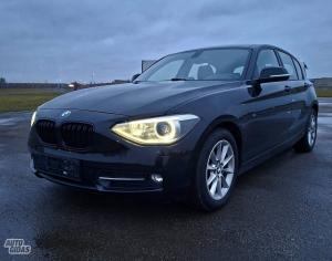 Black BMW 118 2011 in Kaunas, with an engine capacity of 2.00 L and mileage of 200 thousand km for 5100 €, photo 12 on AUTOMOTO.COM.LV