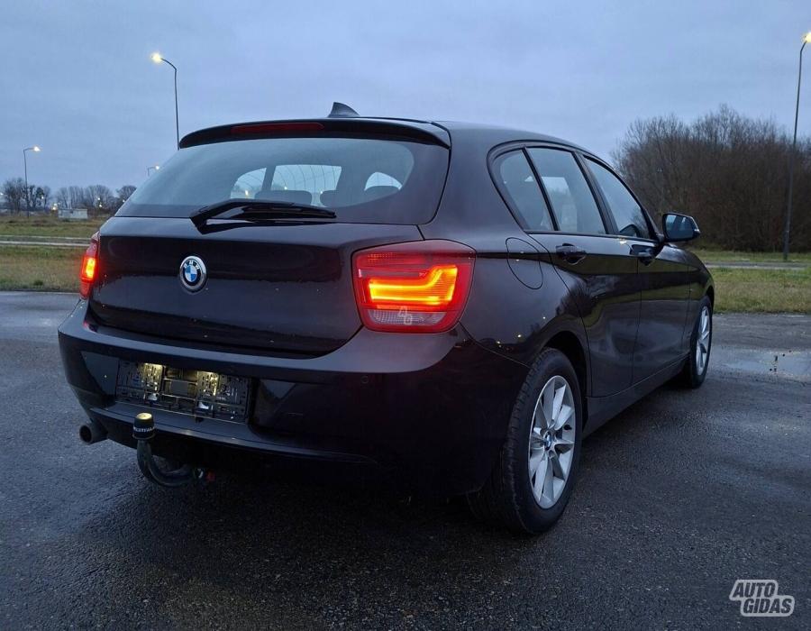 Black BMW 118 2011 in Kaunas, with an engine capacity of 2.00 L and mileage of 200 thousand km for 5100 €, photo 14 on AUTOMOTO.COM.LV