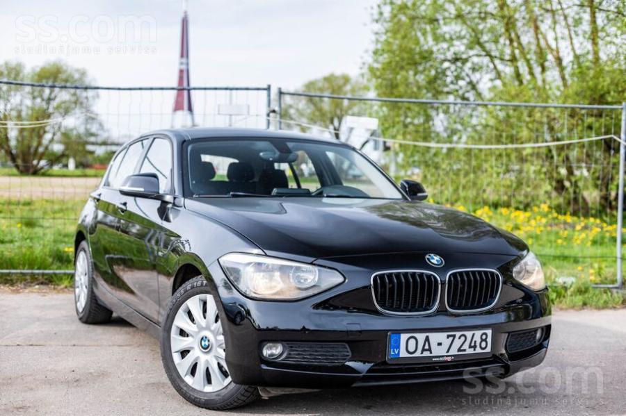 Black BMW 118 2011 in Riga, with an engine capacity of 2.00 L and mileage of 325 thousand km for 6290 €, photo 3 on AUTOMOTO.COM.LV