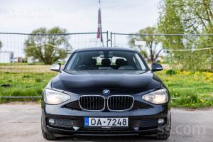 Black BMW 118 2011 in Riga, with an engine capacity of 2.00 L and mileage of 325 thousand km for 6290 €, photo 4 on AUTOMOTO.COM.LV