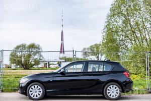 Black BMW 118 2011 in Riga, with an engine capacity of 2.00 L and mileage of 325 thousand km for 6290 €, photo 5 on AUTOMOTO.COM.LV
