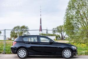 Black BMW 118 2011 in Riga, with an engine capacity of 2.00 L and mileage of 325 thousand km for 6290 €, photo 6 on AUTOMOTO.COM.LV
