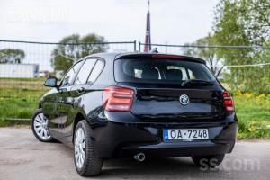 Black BMW 118 2011 in Riga, with an engine capacity of 2.00 L and mileage of 325 thousand km for 6290 €, photo 7 on AUTOMOTO.COM.LV